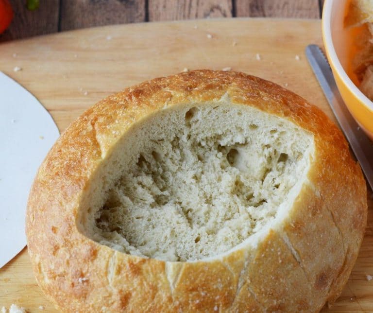 Football Shaped Bread Bowl With Spinach Dip - This Ole Mom