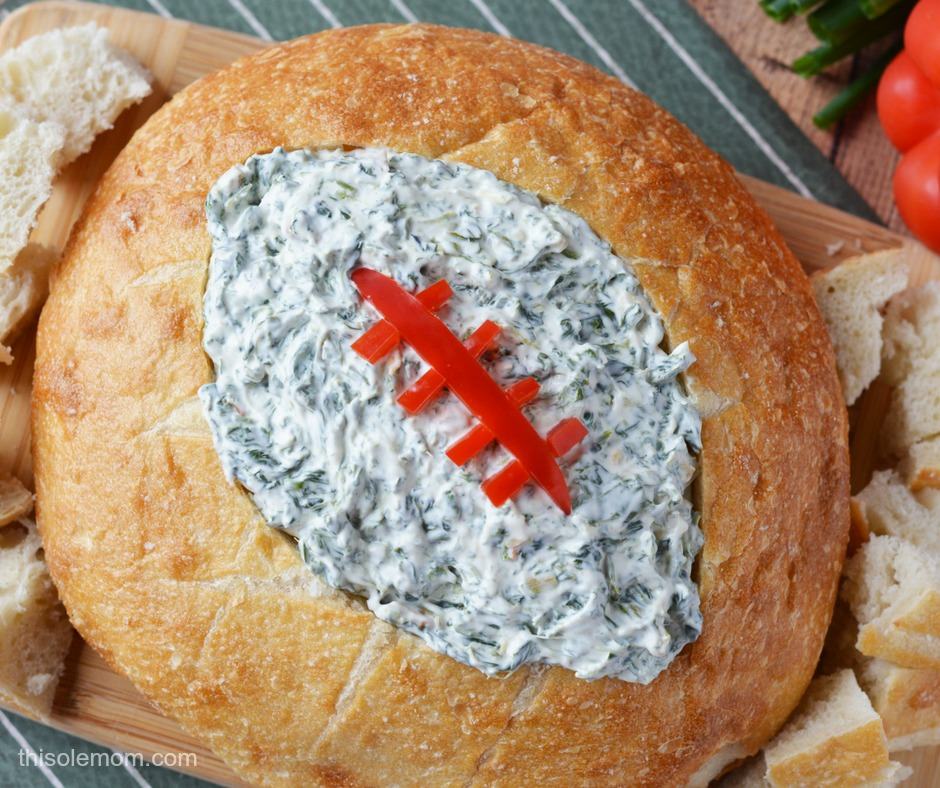 Football Shaped Bread Bowl With Spinach Dip - This Ole Mom