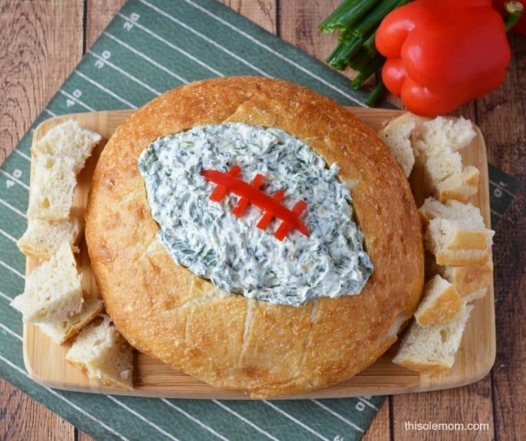 Football Shaped Bread Bowl With Spinach Dip - This Ole Mom